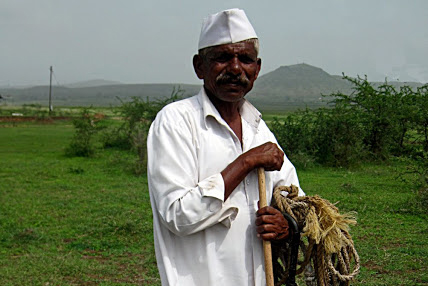 farmer with stick | Osho News