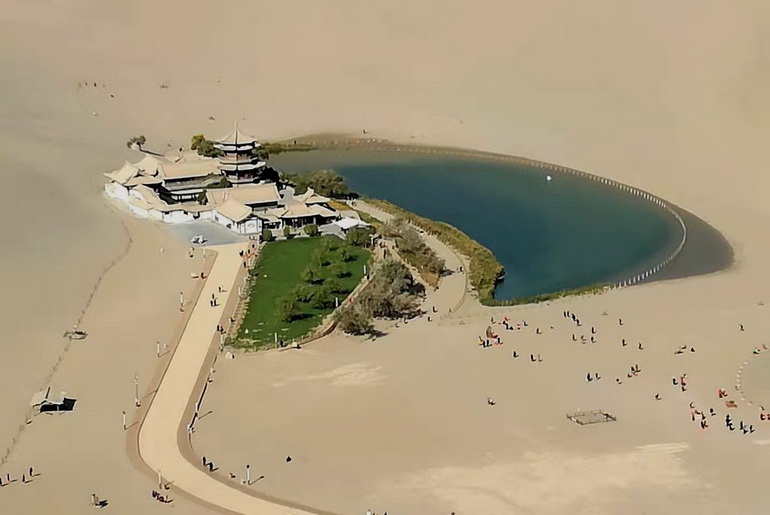 Michael’s photo of the oasis from the top of the dunes | Osho News